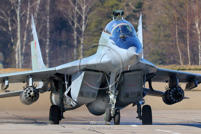 A MiG-29UB jet fighter of the Russian Air Force on flight line in ...