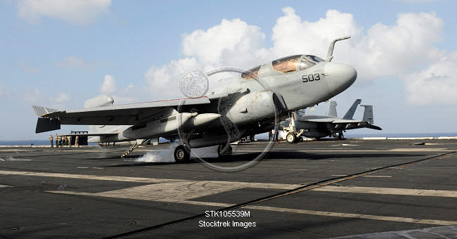 An E/A-6B Prowler makes an arrested landing aboard USS Carl Vinson ...