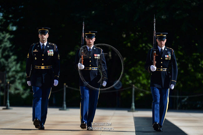 Army Honor Guard soldiers perform the Changing of the Guard at ...