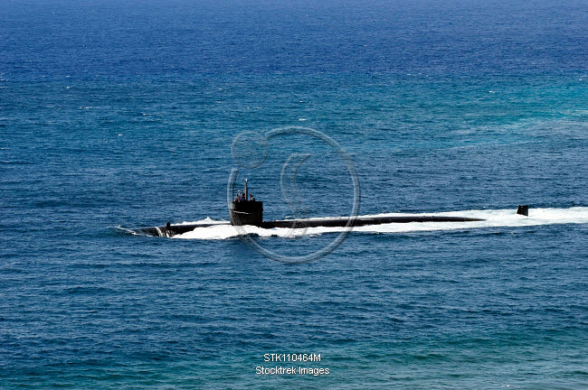 The Los Angeles-class attack submarine USS Chicago departs Apra Harbor ...